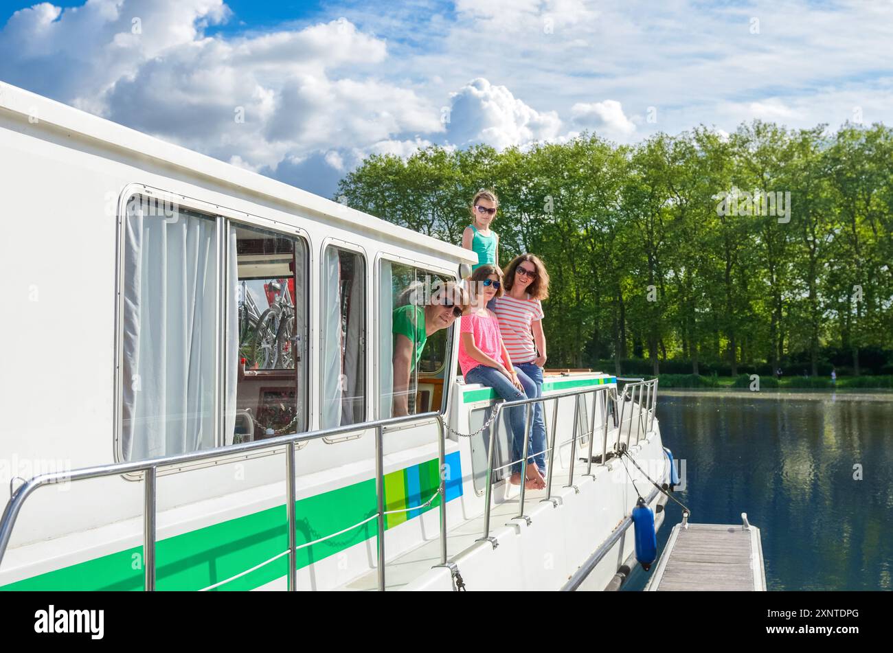 Family vacation, summer holiday travel on barge boat in canal, happy ...
