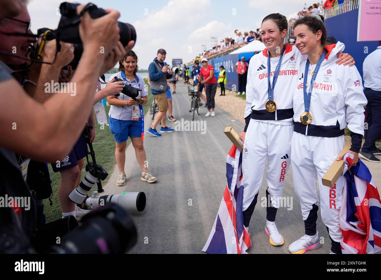 Britain's Emily Craig and Imogen Grant pose for photos after they won ...