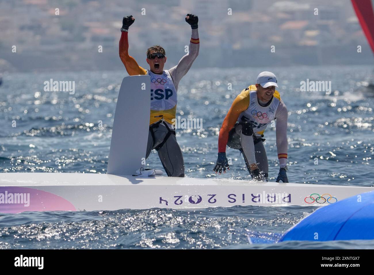 Florian Trittel Paul and Diego Botin Le Chever of Spain celebrate clinching the gold medal in ...