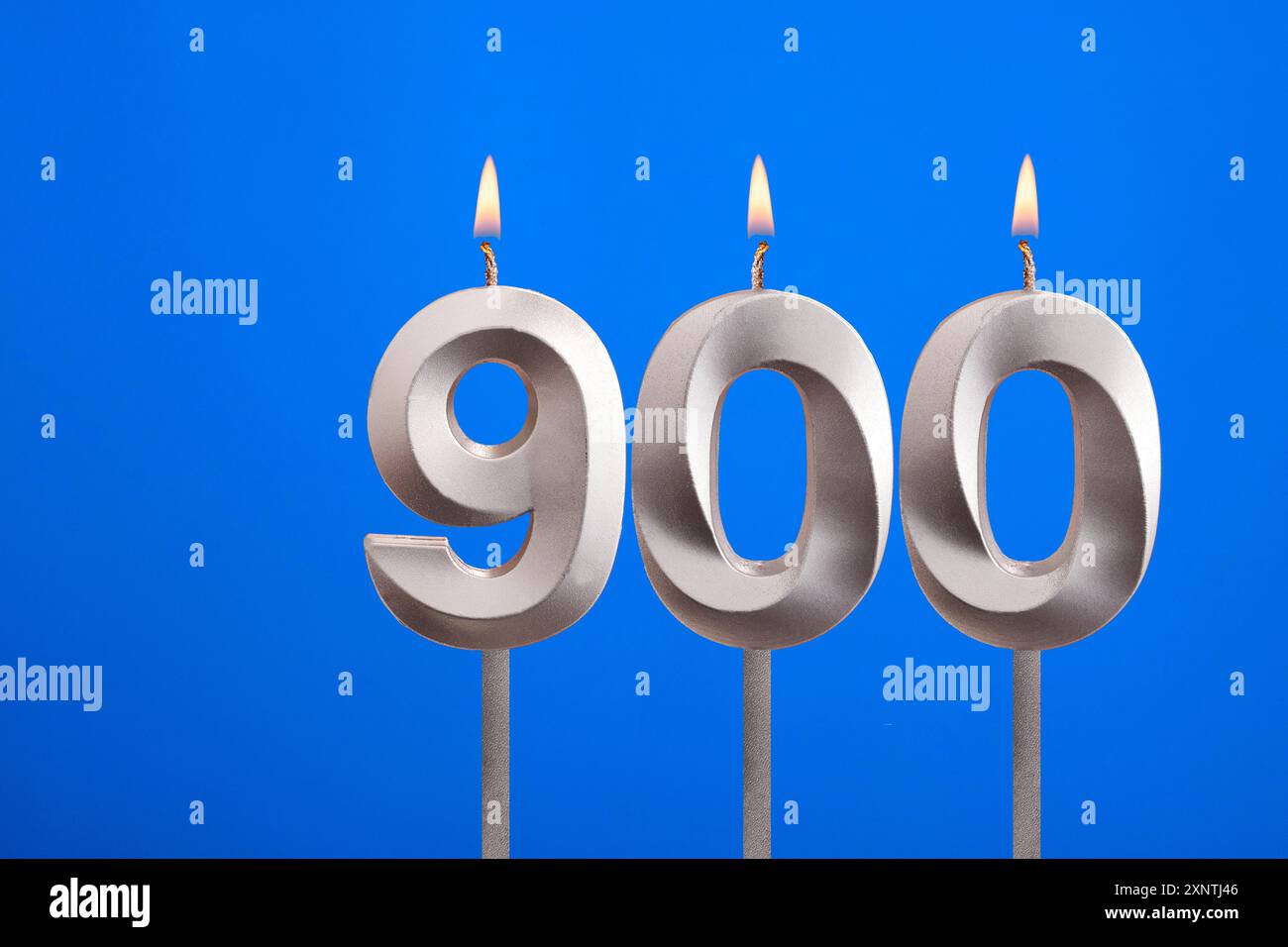 Birthday candle number 900 - Celebration card on blue background Stock ...