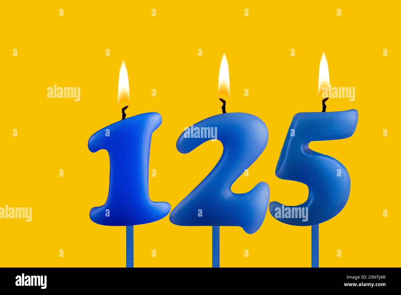 Blue birthday candle on yellow background - Number 125 Stock Photo - Alamy