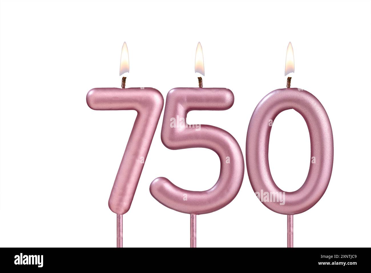 Lit birthday candle - Candle number 750 on white background Stock Photo ...