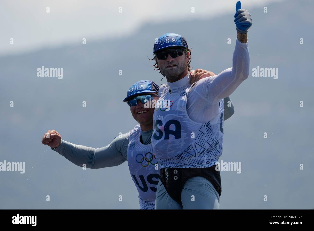 Ian Barrows and Hans Henken of the United States celebrate clinching ...