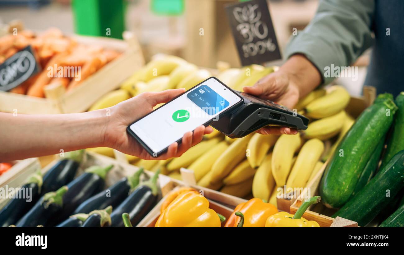 Digital Banking Concept: Shopper Using Cellphone with Contactless ...