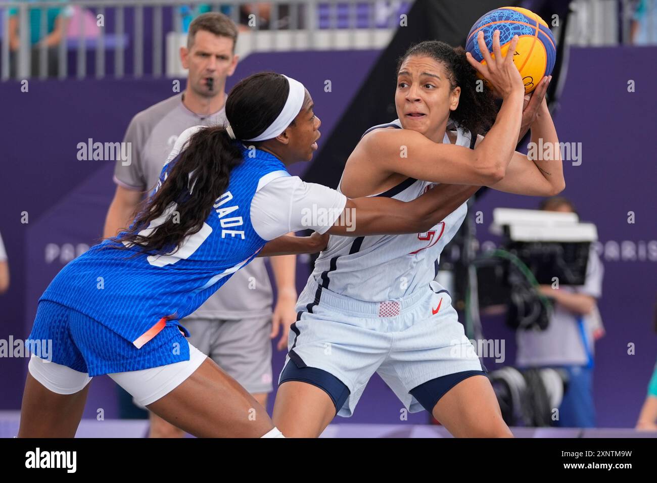 Cierra Burdick, of the United States, protects the ball fro Myriam ...