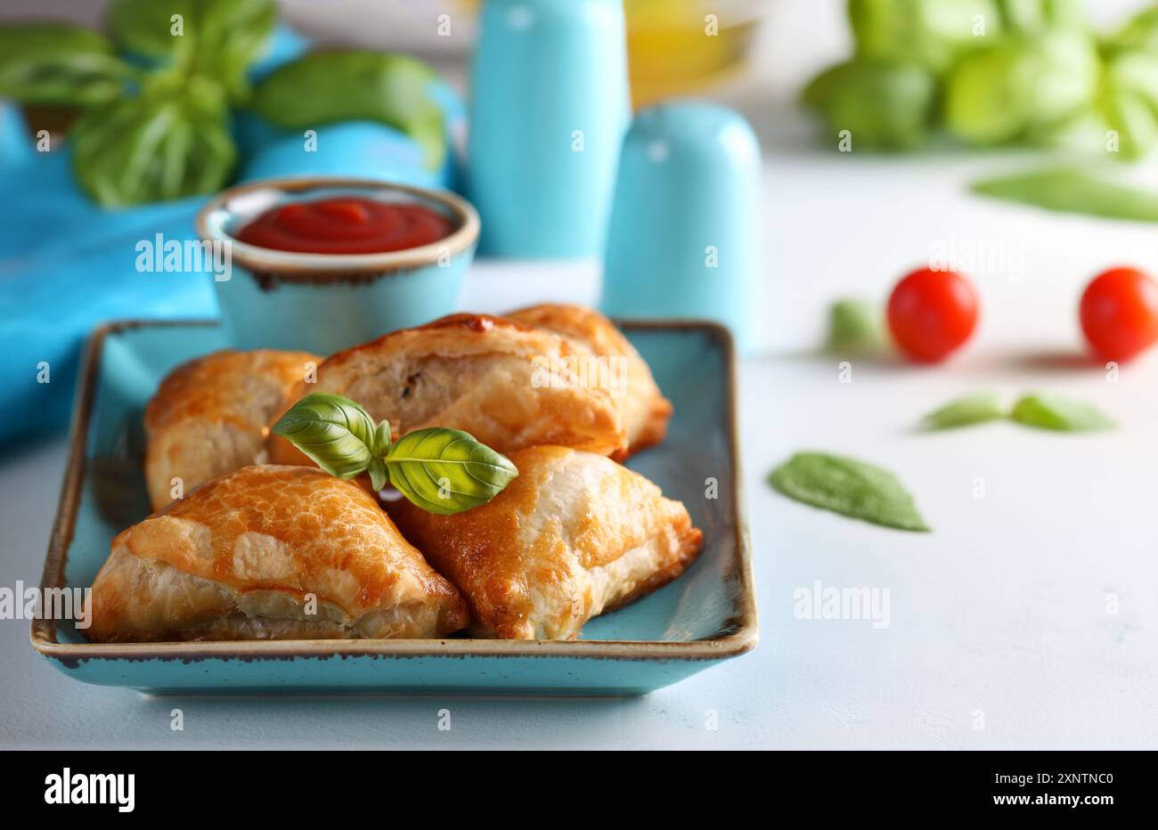 mini samsa snack pies with sauce Stock Photo - Alamy