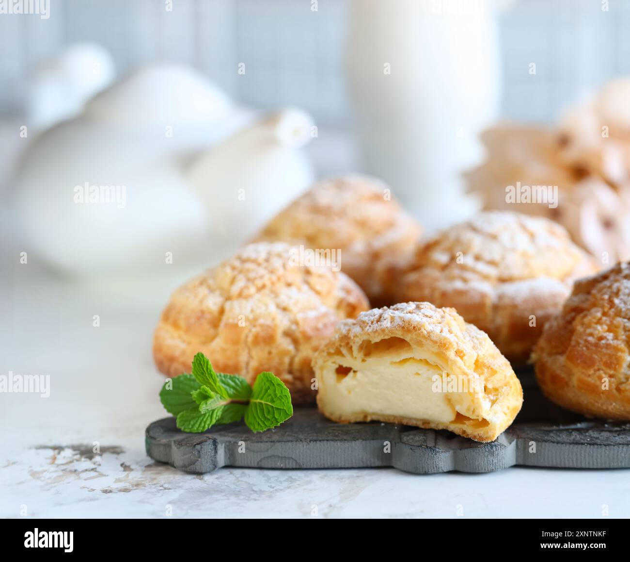 traditional choux pastry eclair dessert on a plate Stock Photo - Alamy