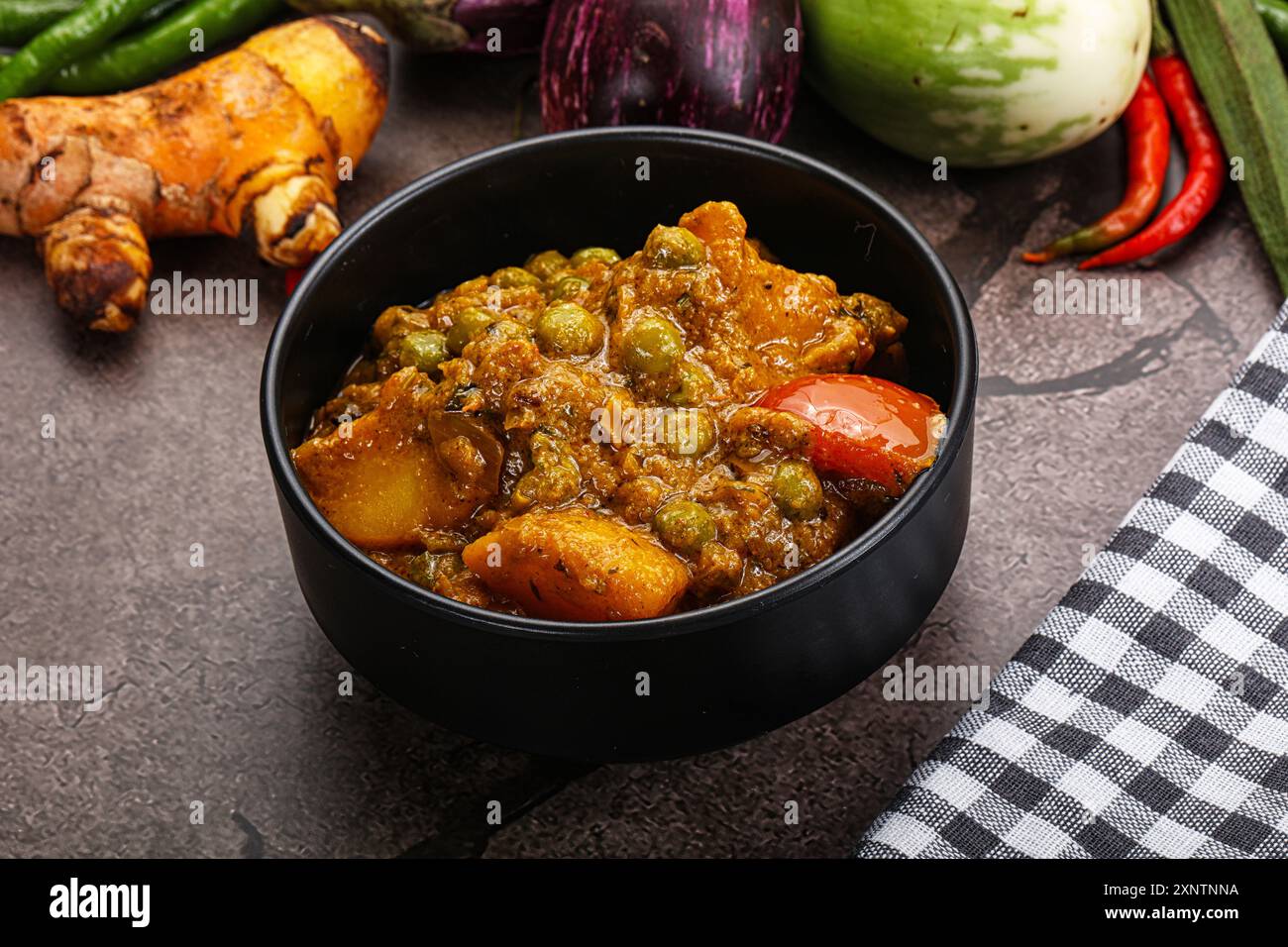 Indian traditional cuisine Aloo mutter - potato with green peas Stock ...