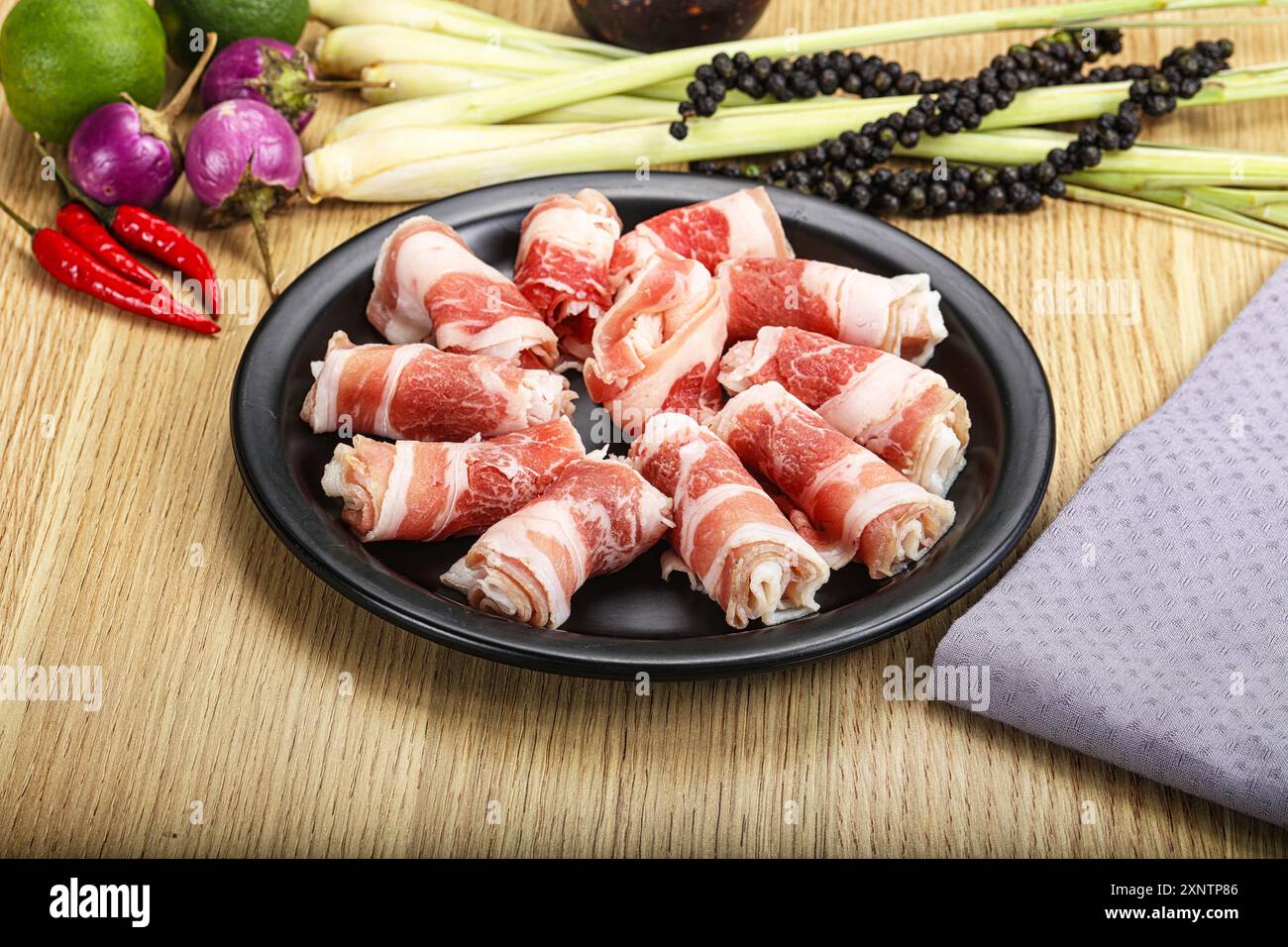 Raw beef bacon roll for grill Stock Photo - Alamy