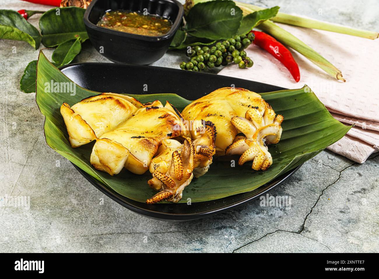 Delicous Grilled cuttlefish with sauce asian style Stock Photo - Alamy