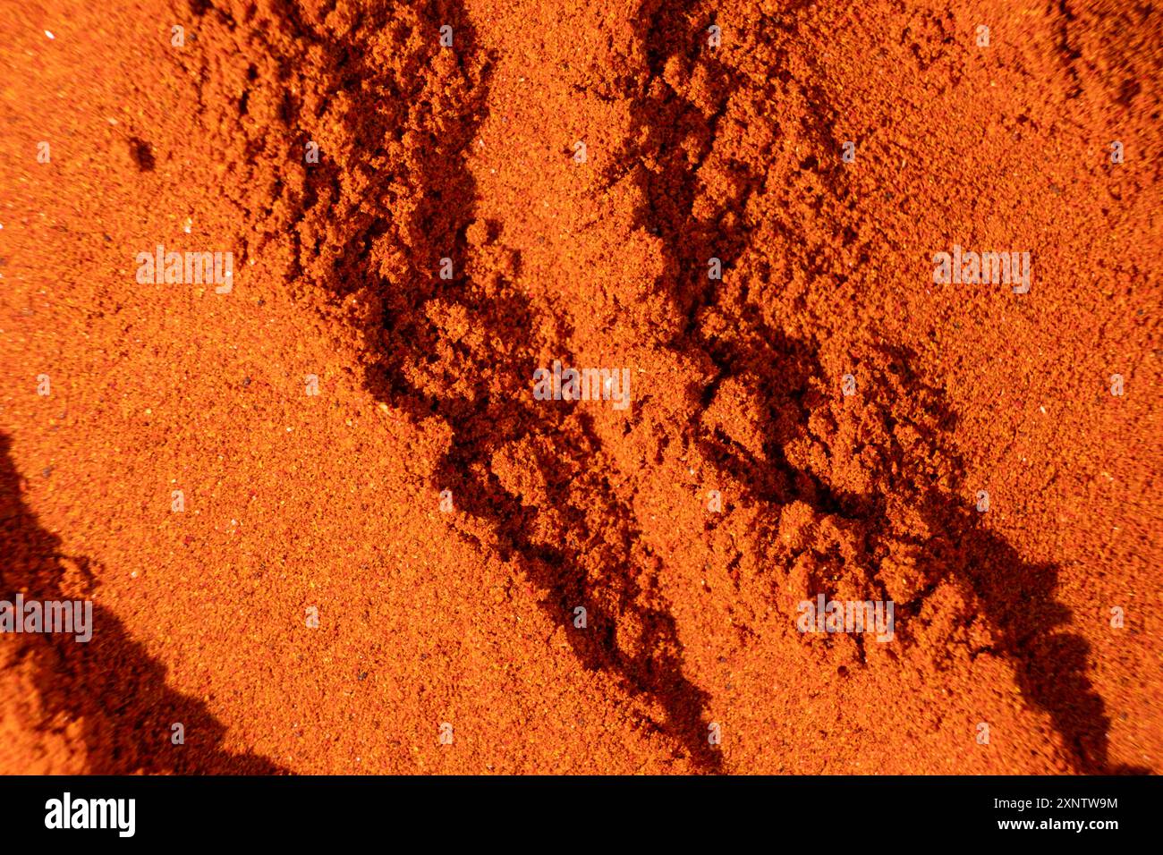 Ground paprika, red terracotta spice background, art in cooking Stock ...