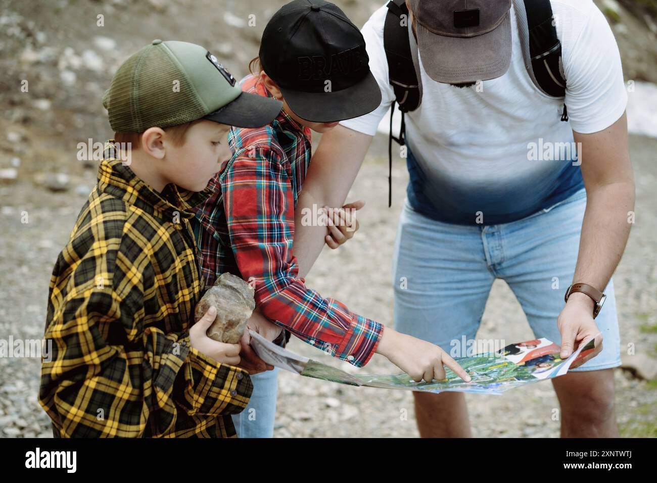Children looking at map in forest hi-res stock photography and images ...