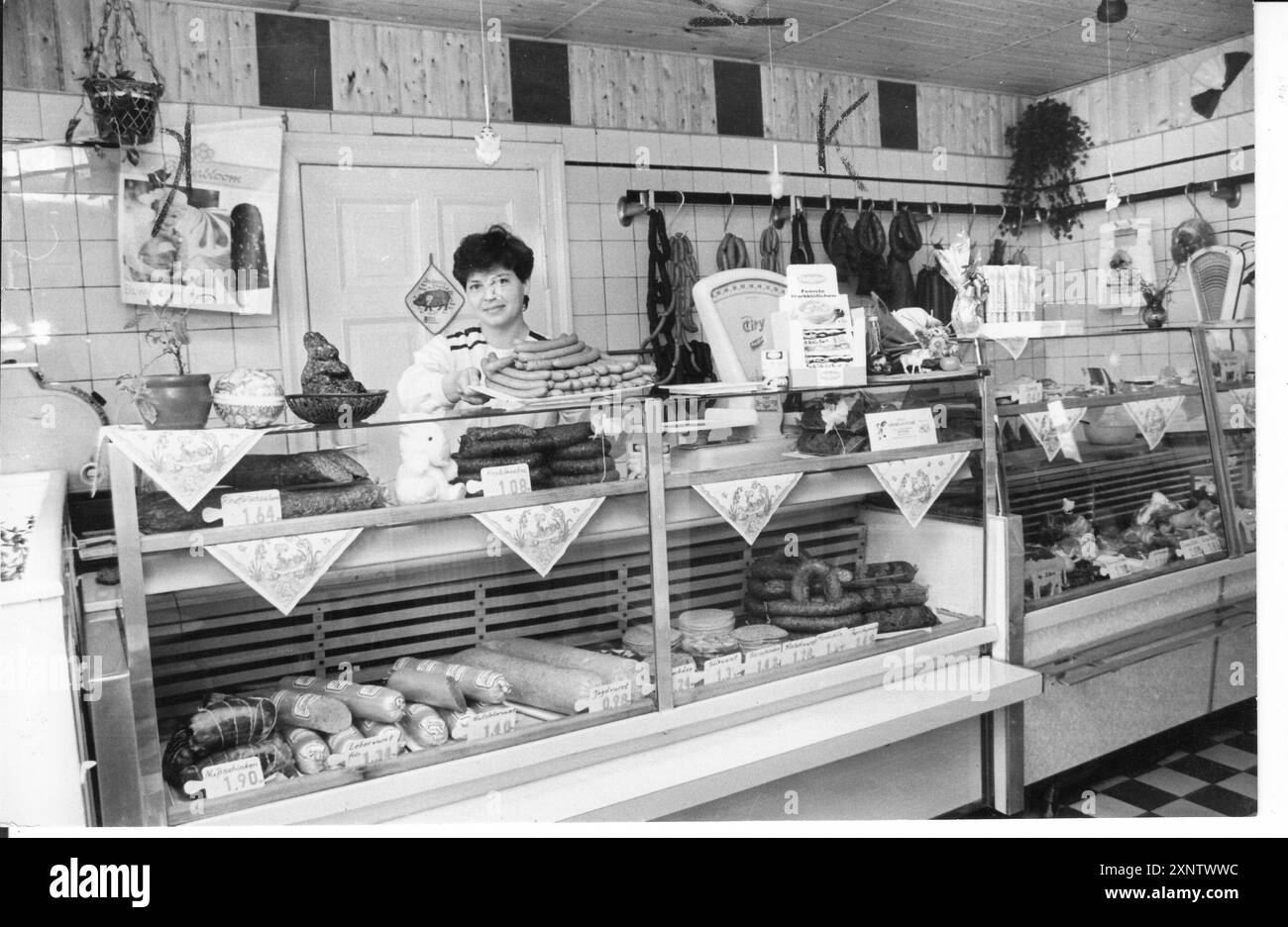 Butcher in the Drewitz development area in Potsdam. Sausage and meat ...