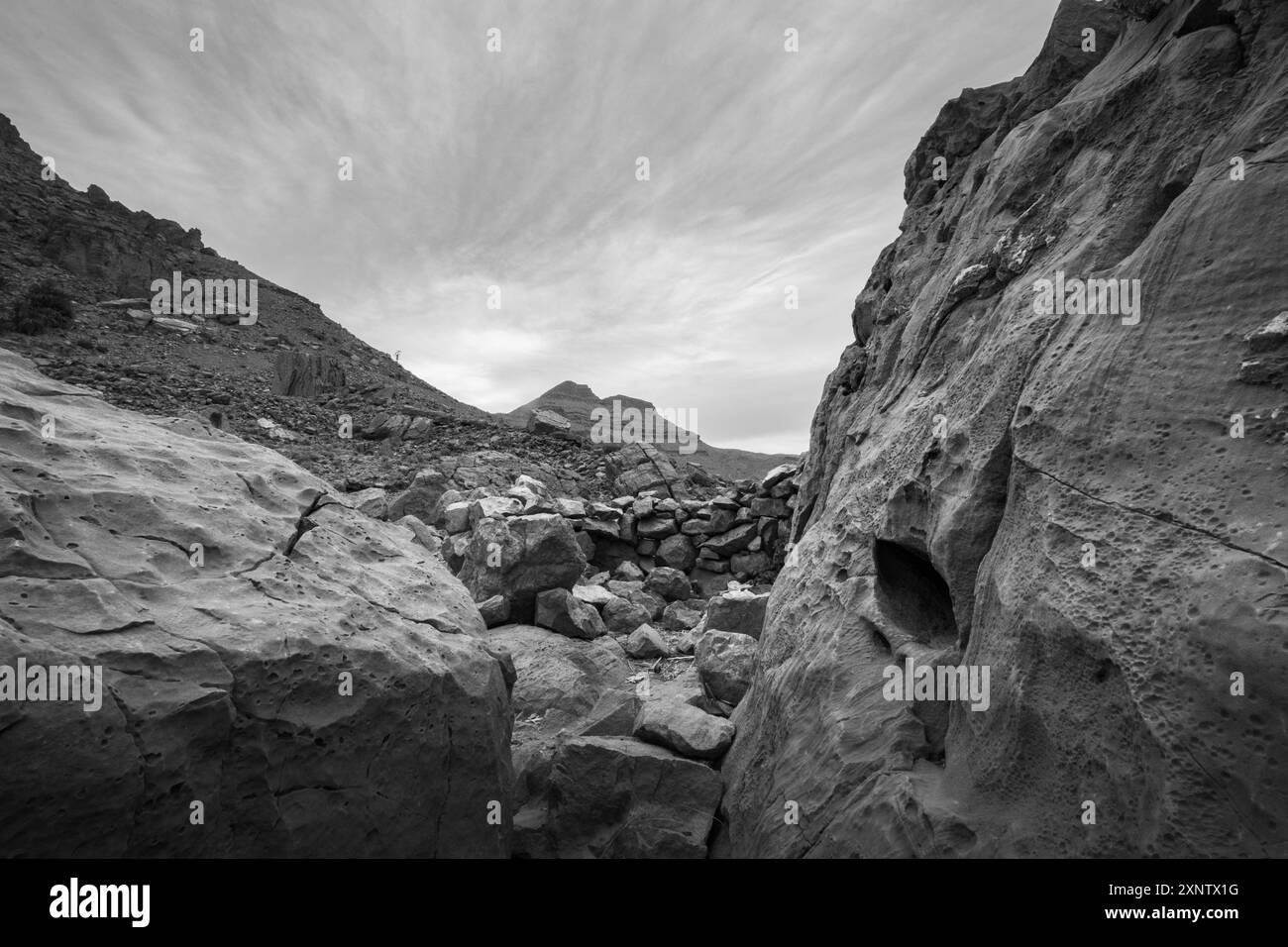 Dramatic composition based on two huge rocks and a hill in the ...