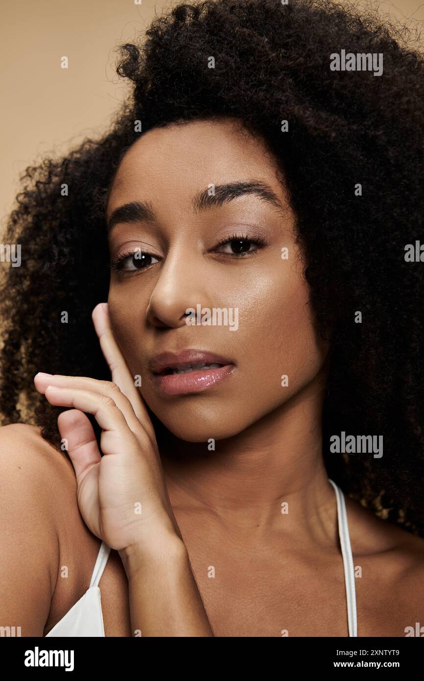 A close-up portrait of a beautiful African American woman with natural ...