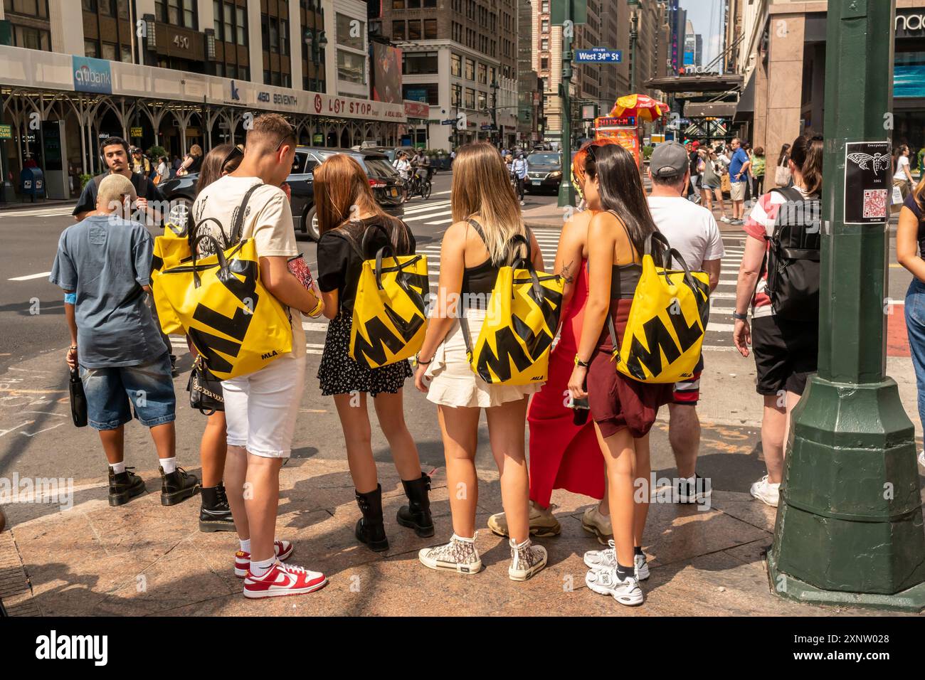 MLA / Move Language Ahead tour group waits to cross the street in ...