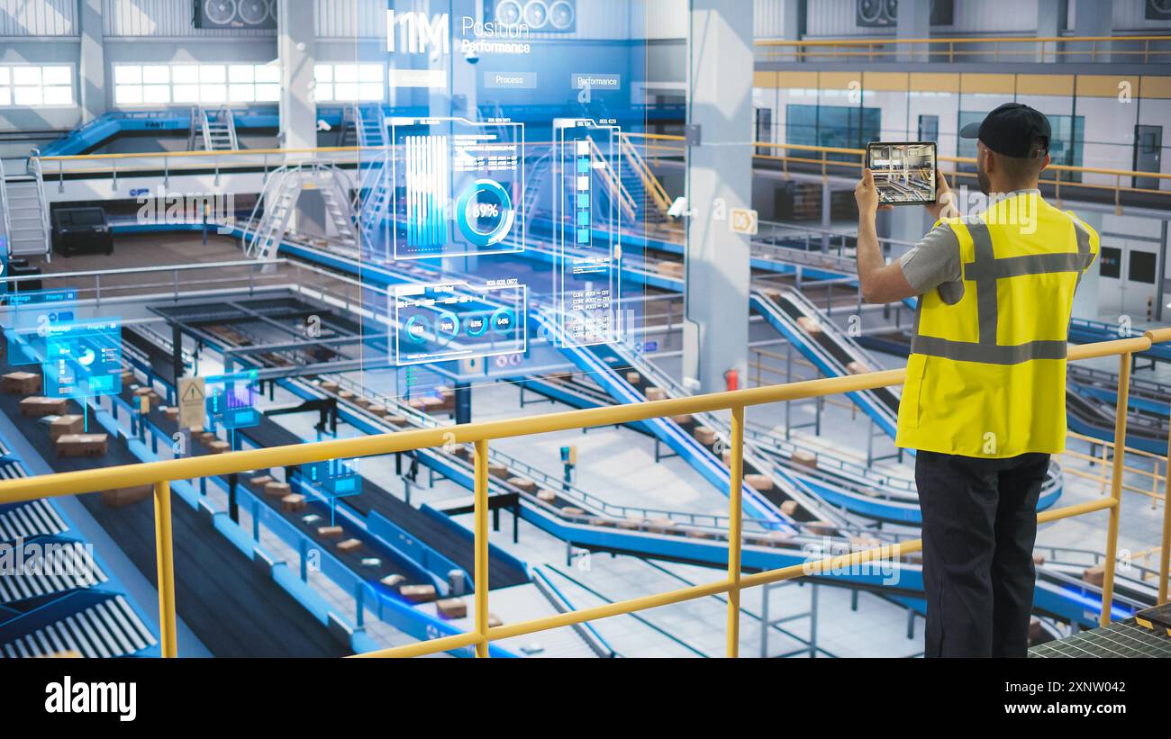 Male in a High Visibility Vest Using Tablet with Augmented Reality App ...