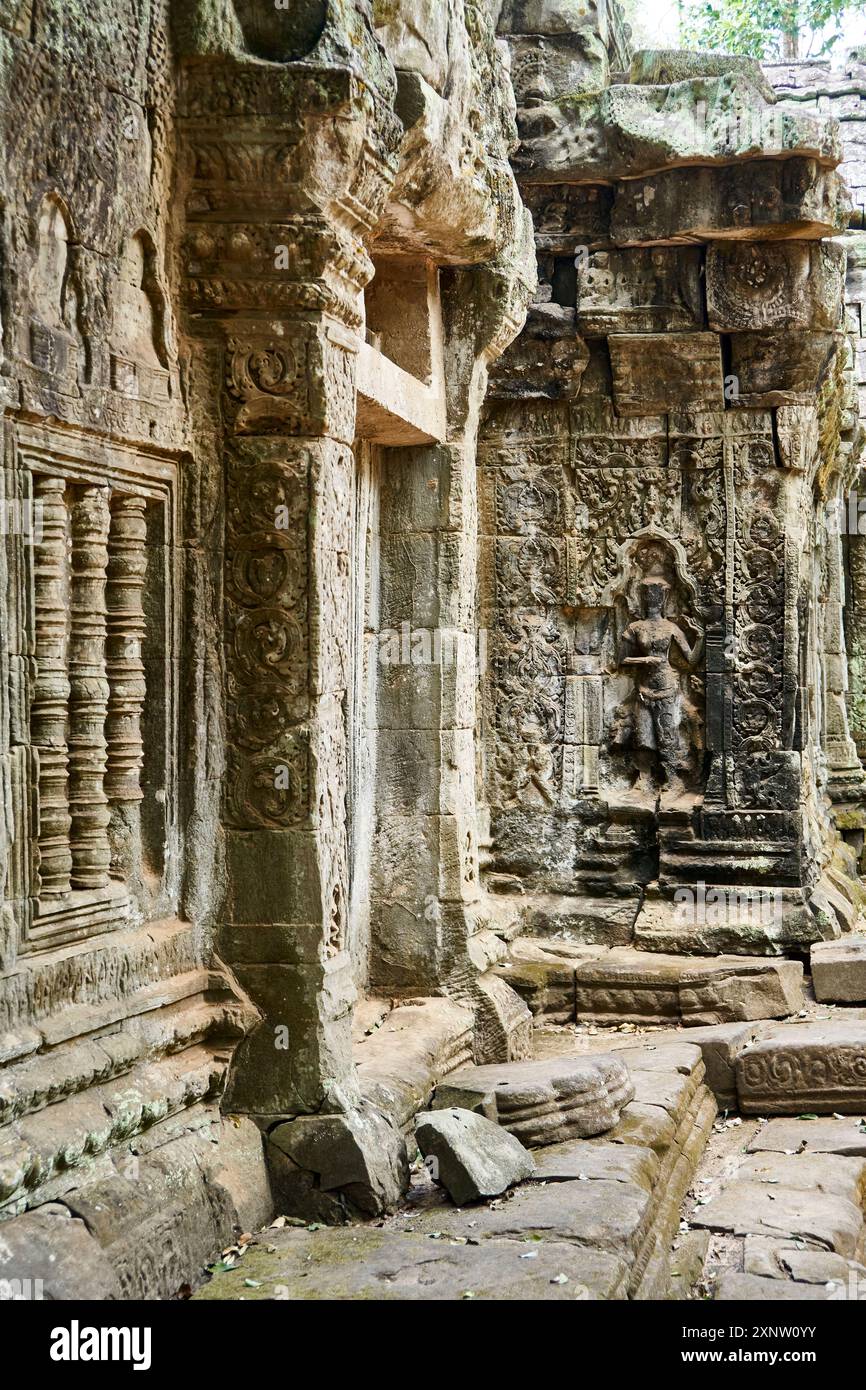 Intricate carvings on the ancient stone structures at Angkor Thom ...