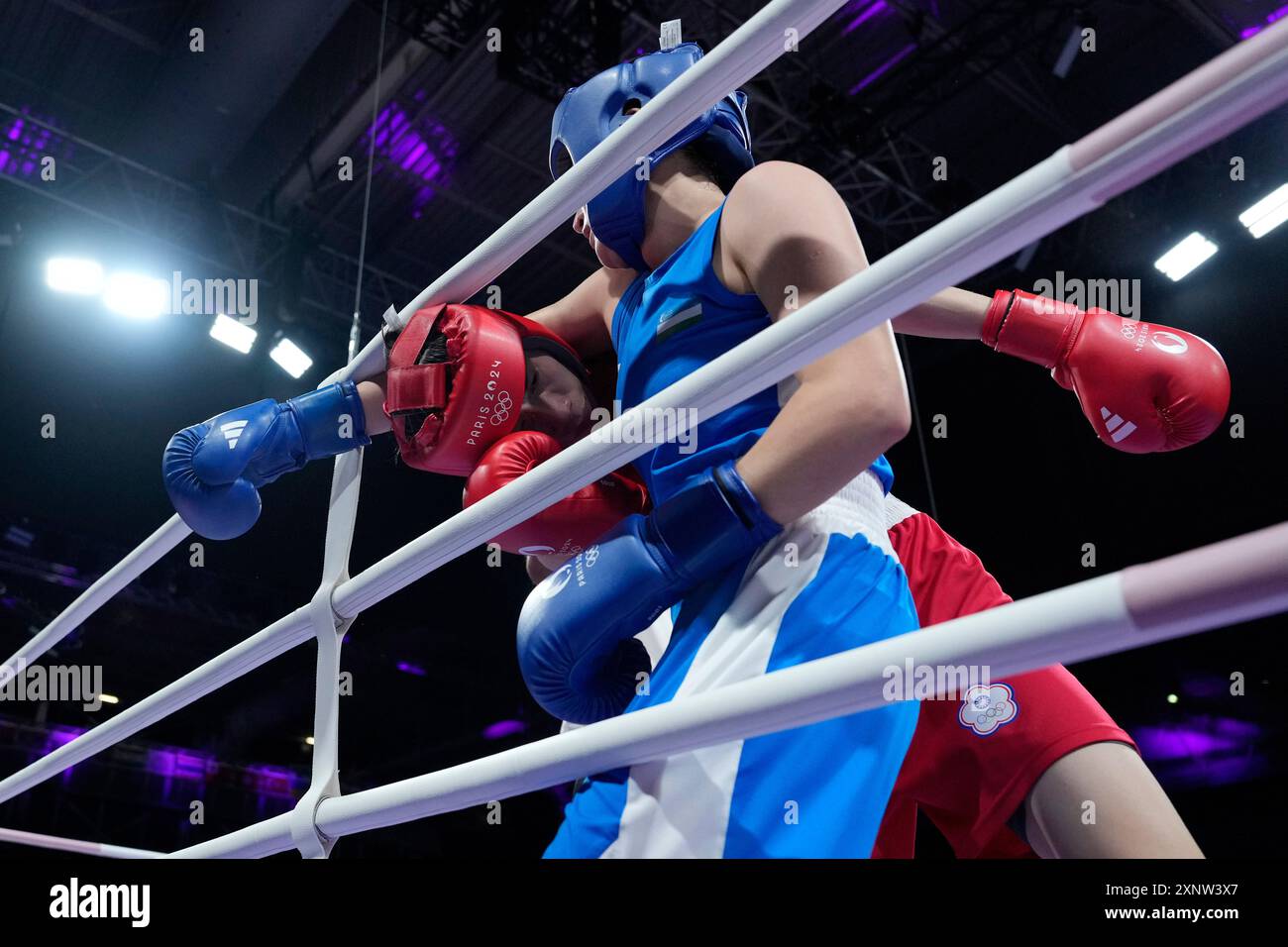 Taiwan's Lin Yu-ting, left, fights Uzbekistan's Sitora Turdibekova in ...