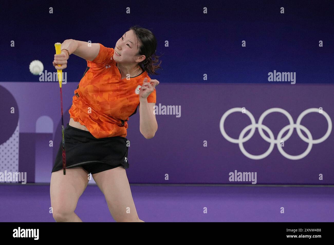 Japan's Arisa Higashino plays next to her teammate Yuta Watanabe ...