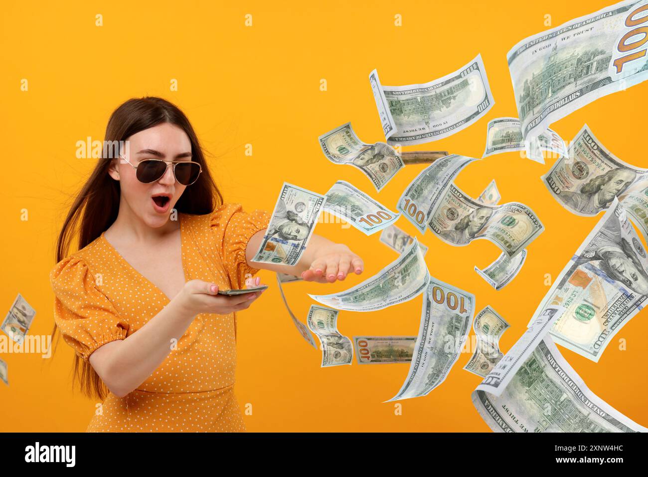 Happy young woman throwing orange hi-res stock photography and images ...