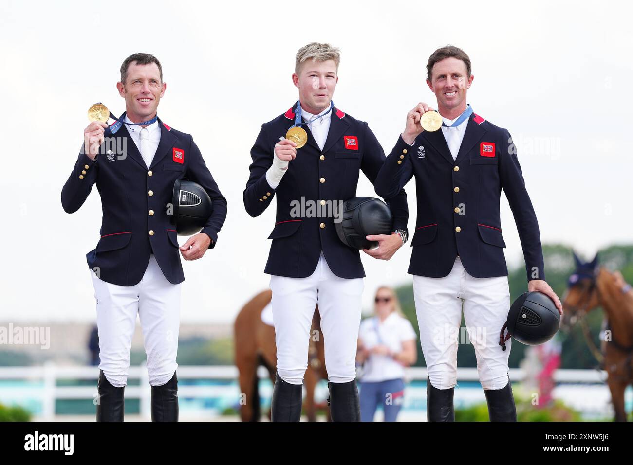 Great Britain's Scott Brash (left), Ben Maher (right) and Harry Charles ...