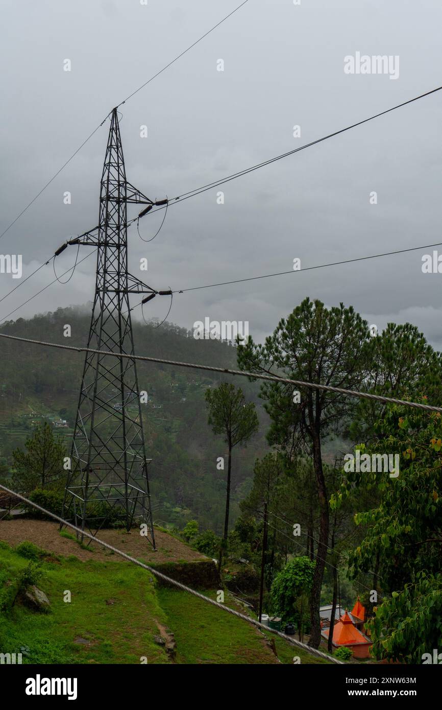 High-voltage electrical wires distributing electricity in the upper ...