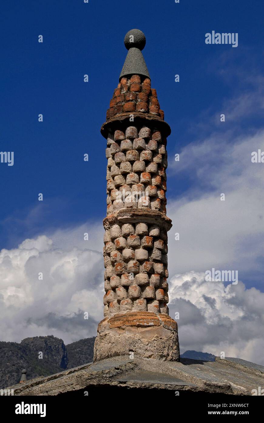 Brick finial at corner of stone wall surrounding the grounds of the ...