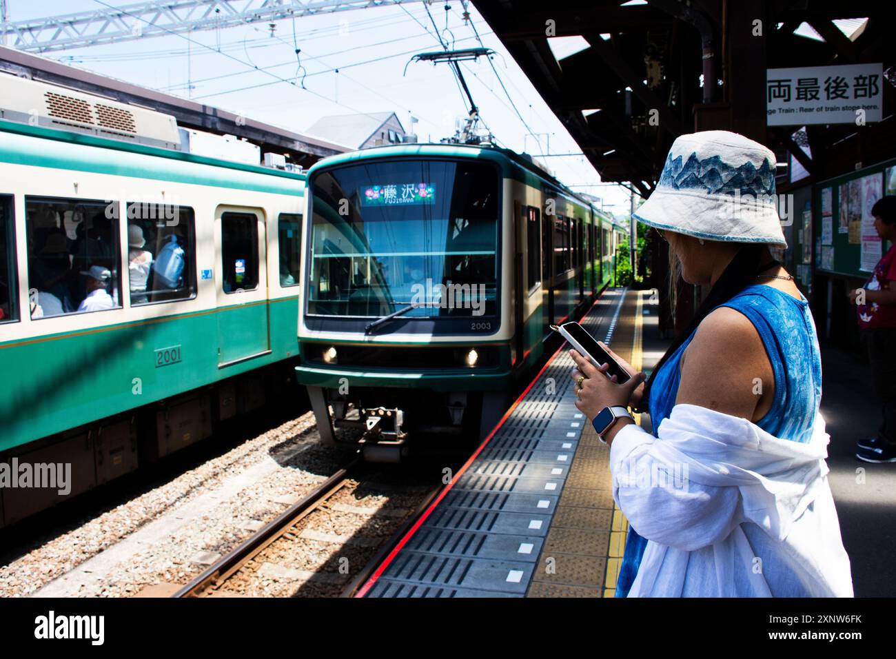 Travelers thai women people journey by Enoshima Dentetsu Line or Enoden ...