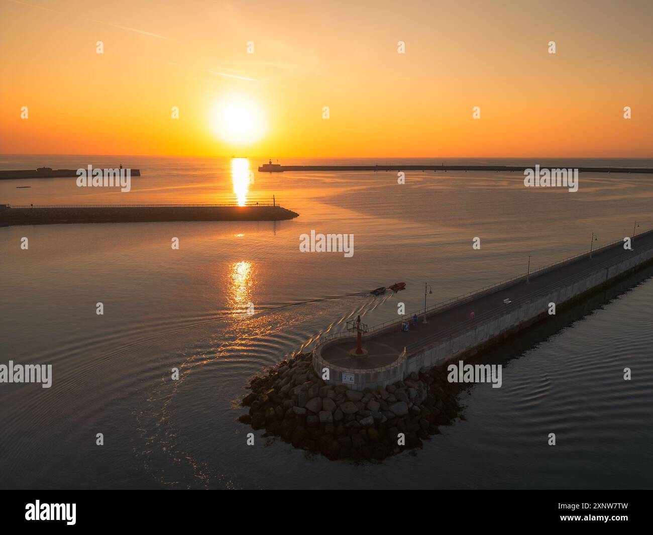 Late July sunrise at Dún Laoghaire Harbour Stock Photo - Alamy
