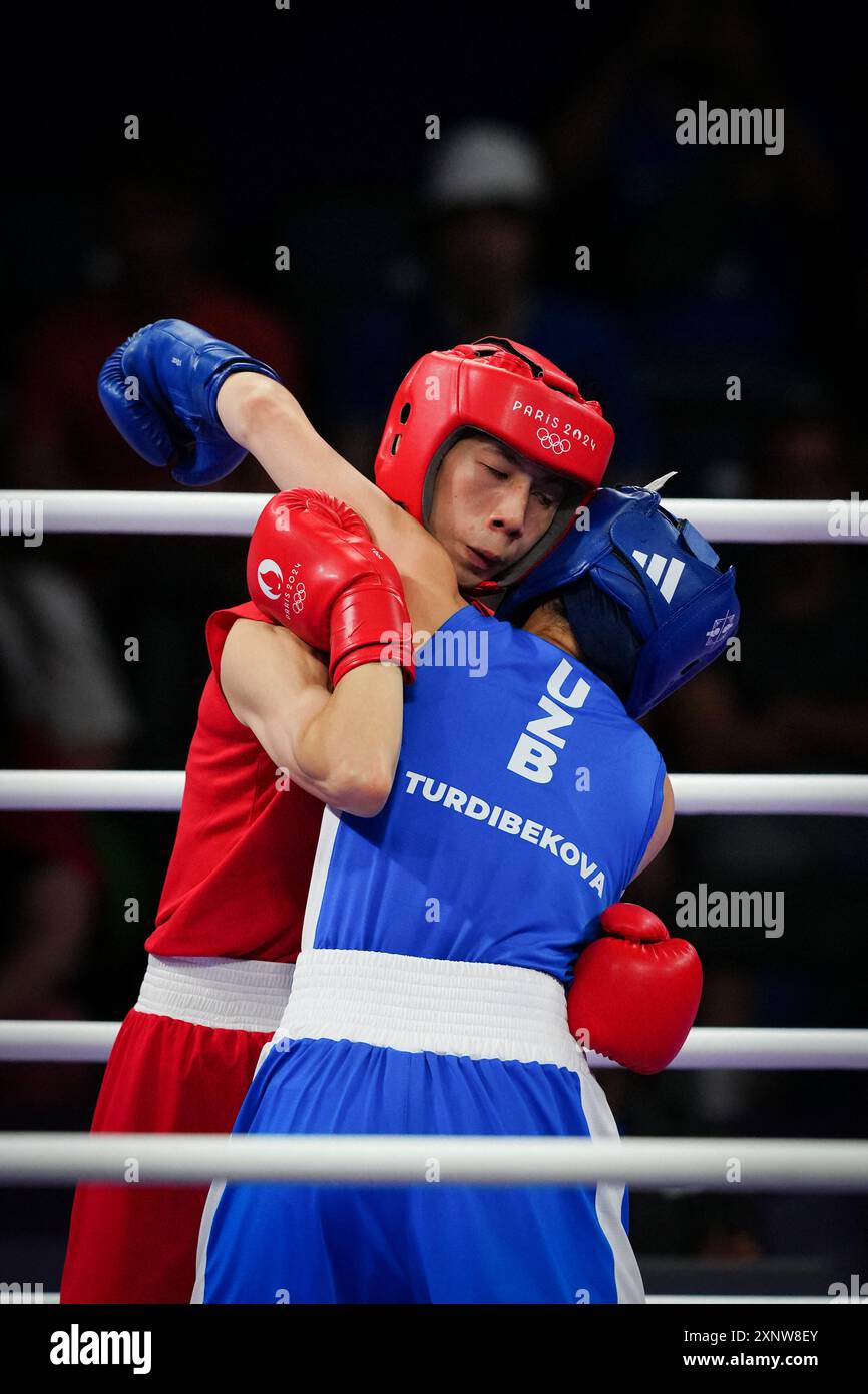 Chinese Taipei's controversial boxer Lin Yu-ting ( in red ) won her ...