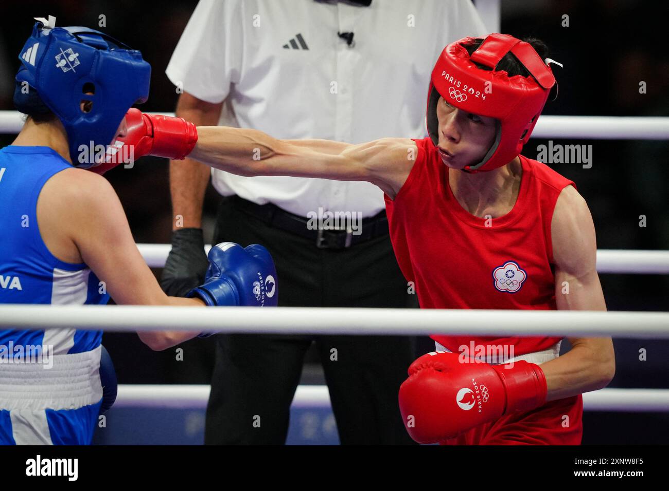 Chinese Taipei's controversial boxer Lin Yu-ting ( in red ) won her ...