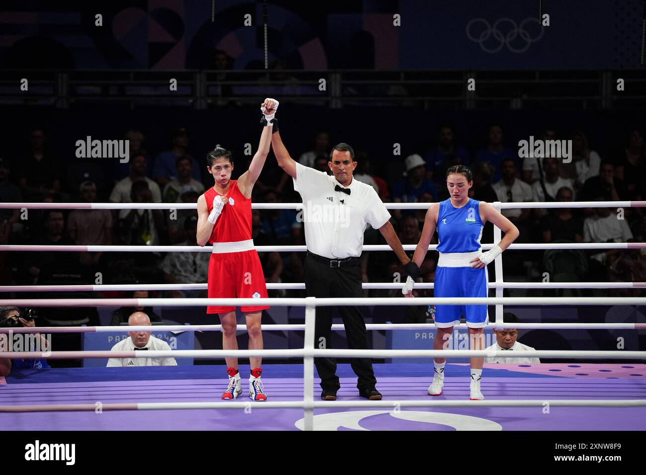 Chinese Taipei's controversial boxer Lin Yu-ting ( in red ) won her ...