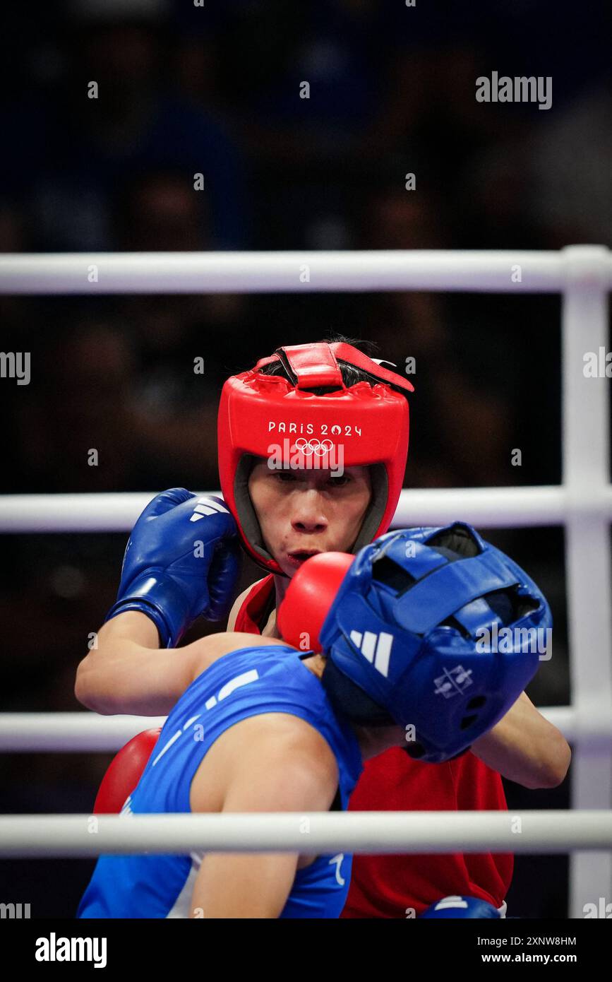 Chinese Taipei's controversial boxer Lin Yu-ting ( in red ) won her ...