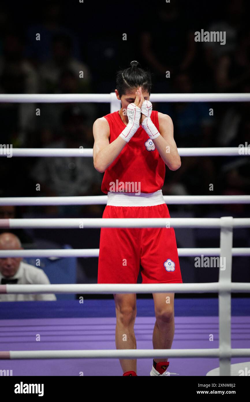 Chinese Taipei's controversial boxer Lin Yu-ting ( in red ) won her ...