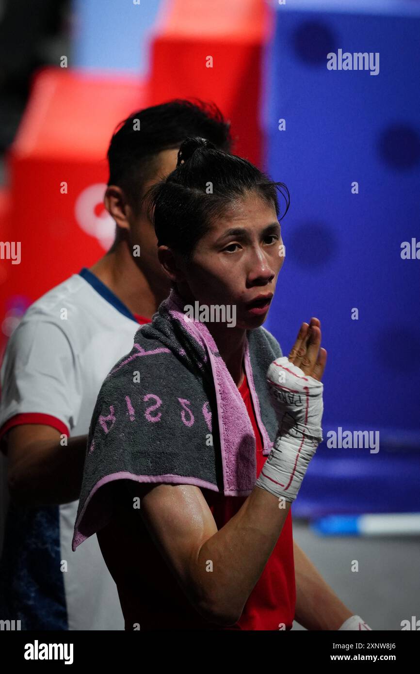 Chinese Taipei's controversial boxer Lin Yu-ting ( in red ) won her ...