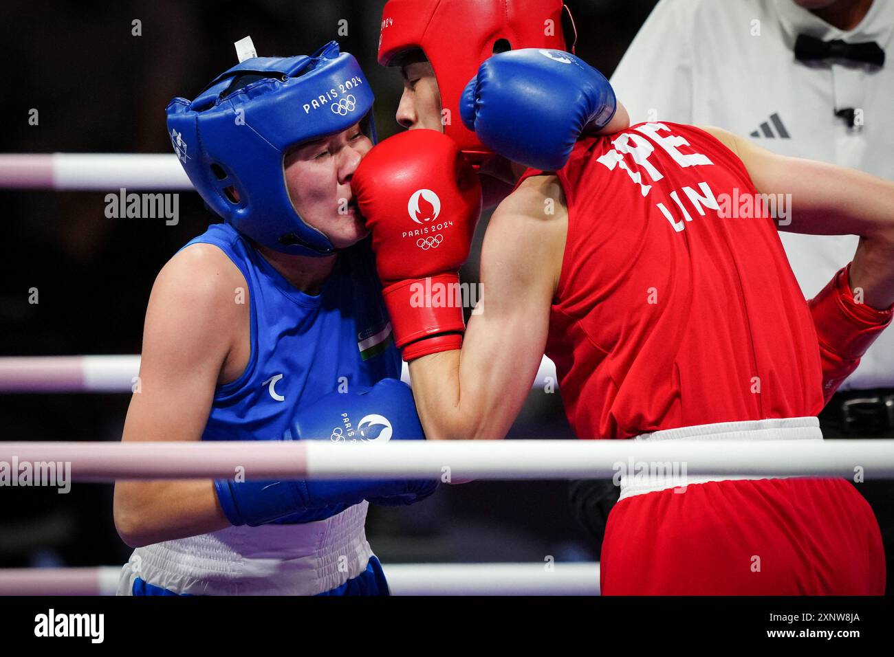 Chinese Taipei's controversial boxer Lin Yu-ting ( in red ) won her ...