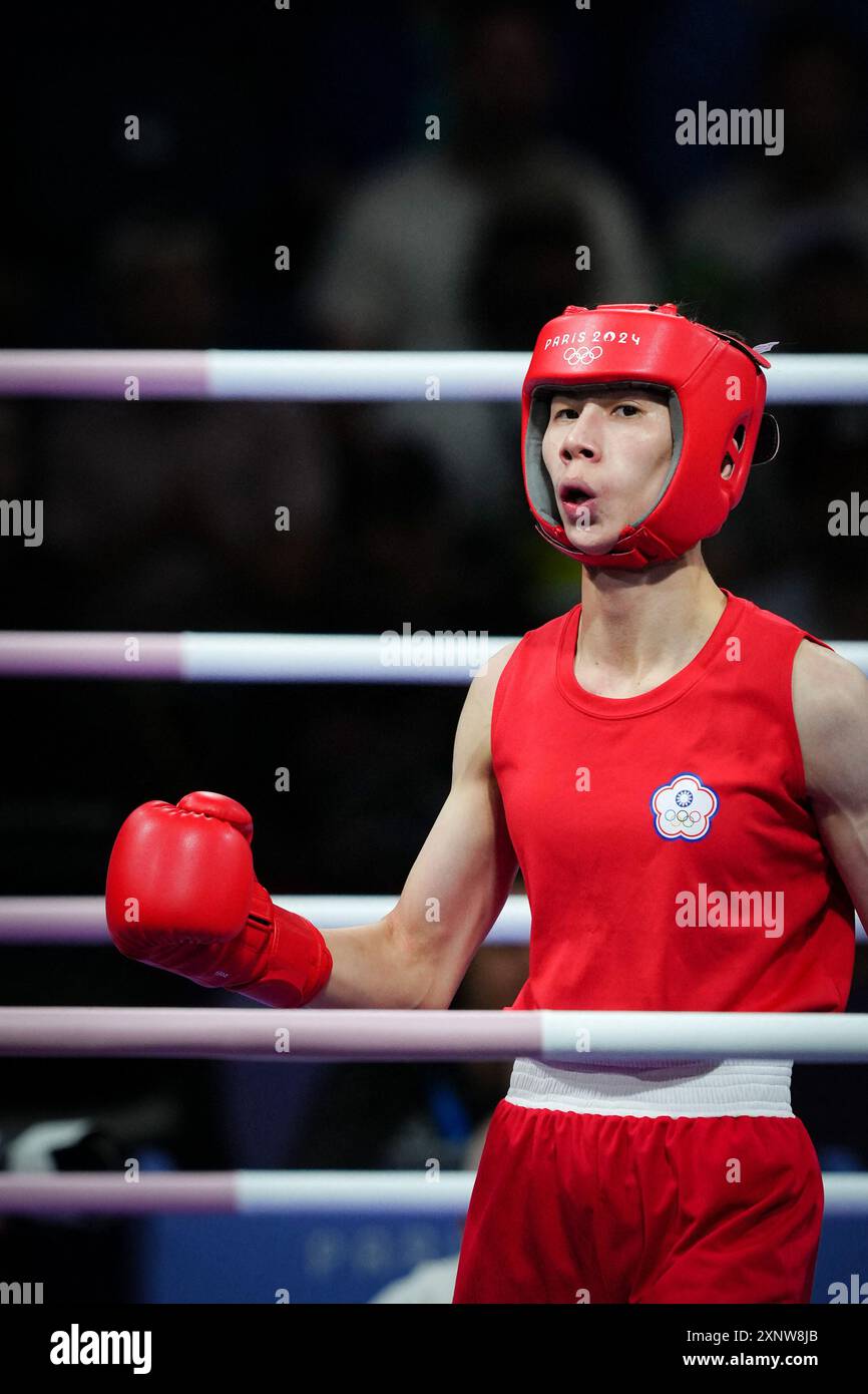 Chinese Taipei's controversial boxer Lin Yu-ting ( in red ) won her ...