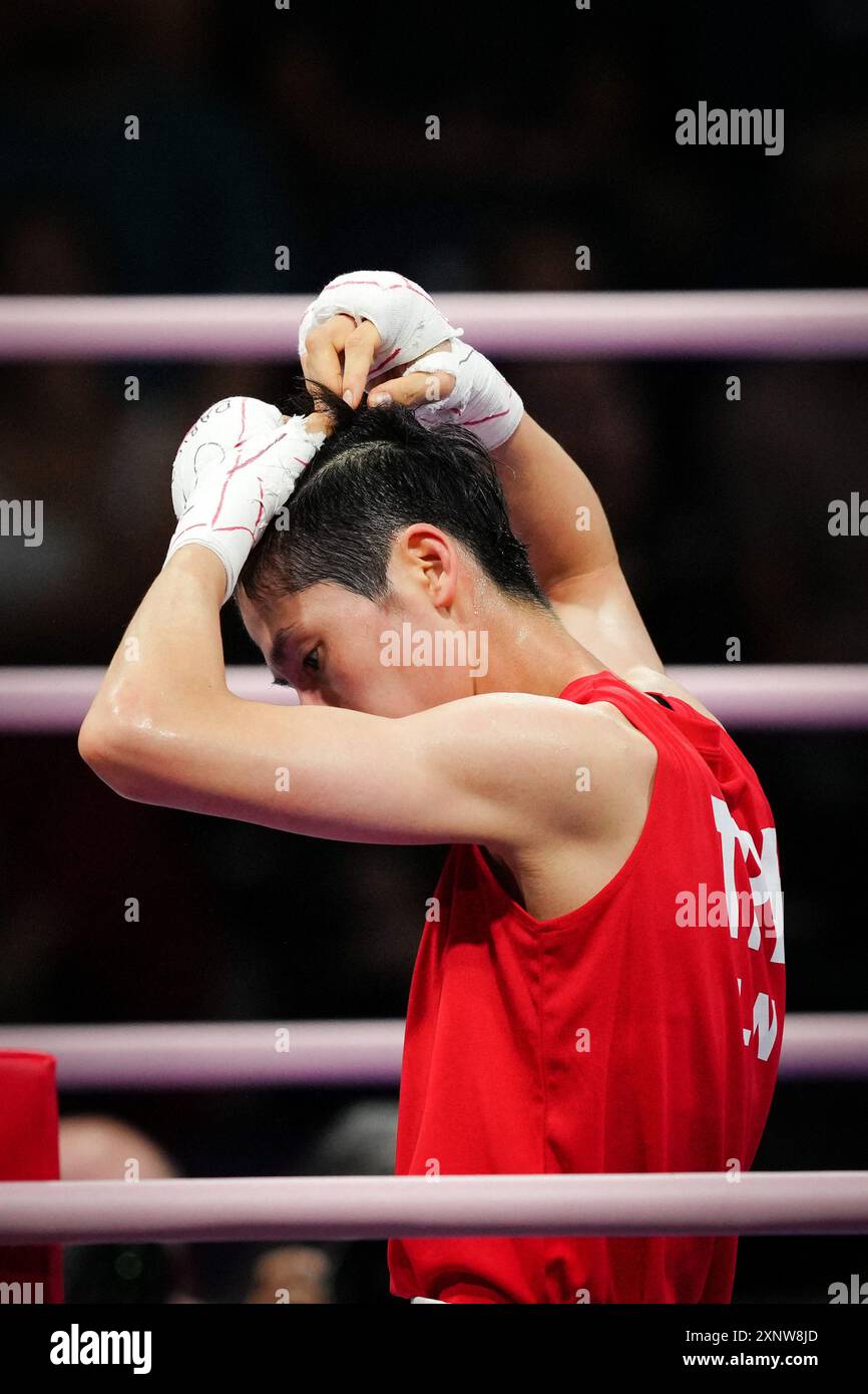 Chinese Taipei's controversial boxer Lin Yu-ting ( in red ) won her ...