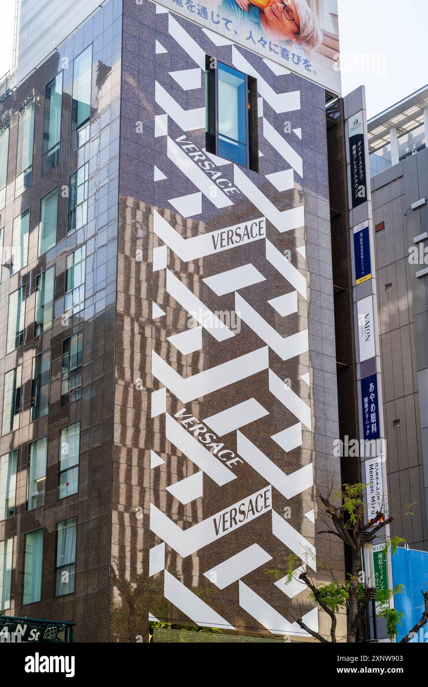 Facade of the Versace flagship fashion store on the Ginza. Brown ...