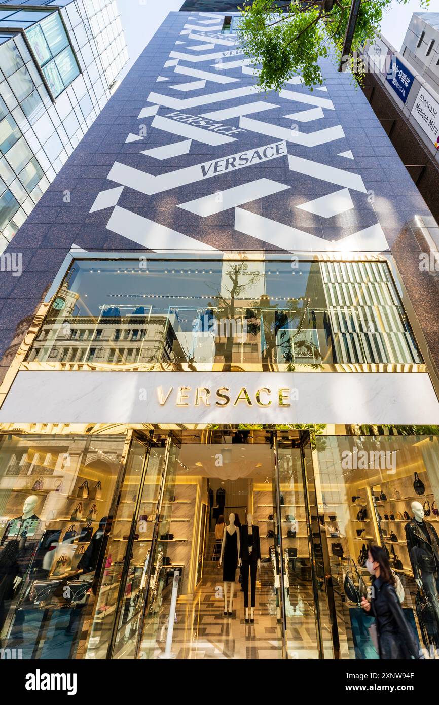 Low angle shot of the entrance to the Versace fashion store on the ...