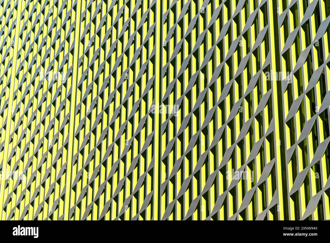 Green vertical slats overlaid with a diamond shaped grey diagonal ...