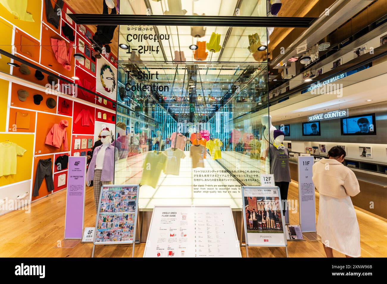 Interior of the Ginza UniQlo flagship store. Ground floor display of t ...