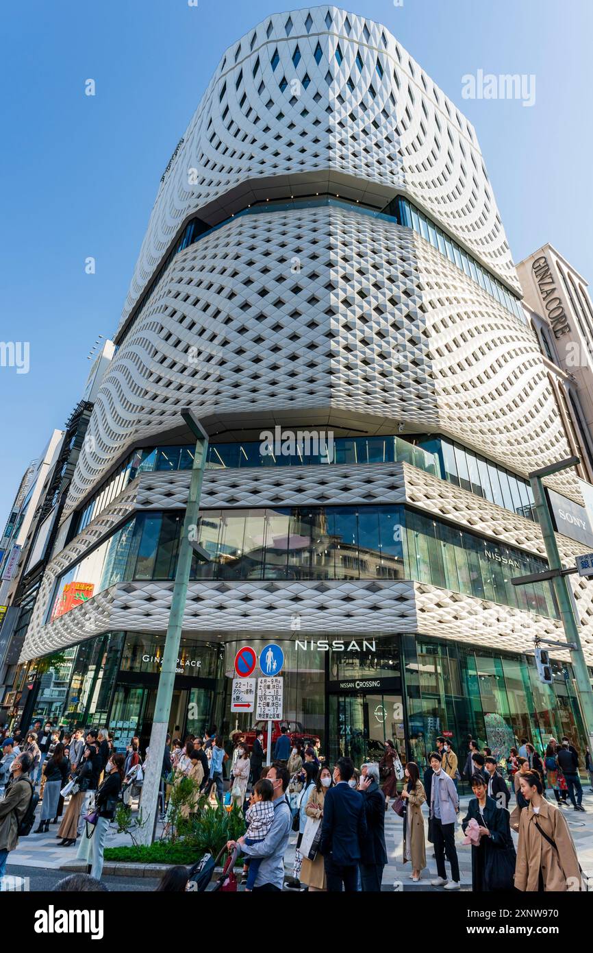 The landmark white clad Ginza Place building with the first floor a ...