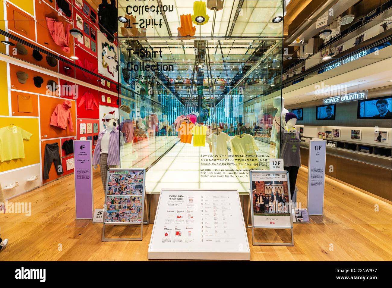 Interior of the Ginza UniQlo flagship store. Ground floor display of t ...