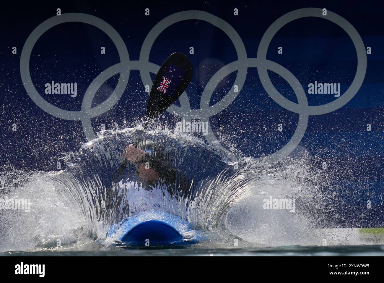 Finn Butcher of New Zealand competes in the men's kayak cross time ...