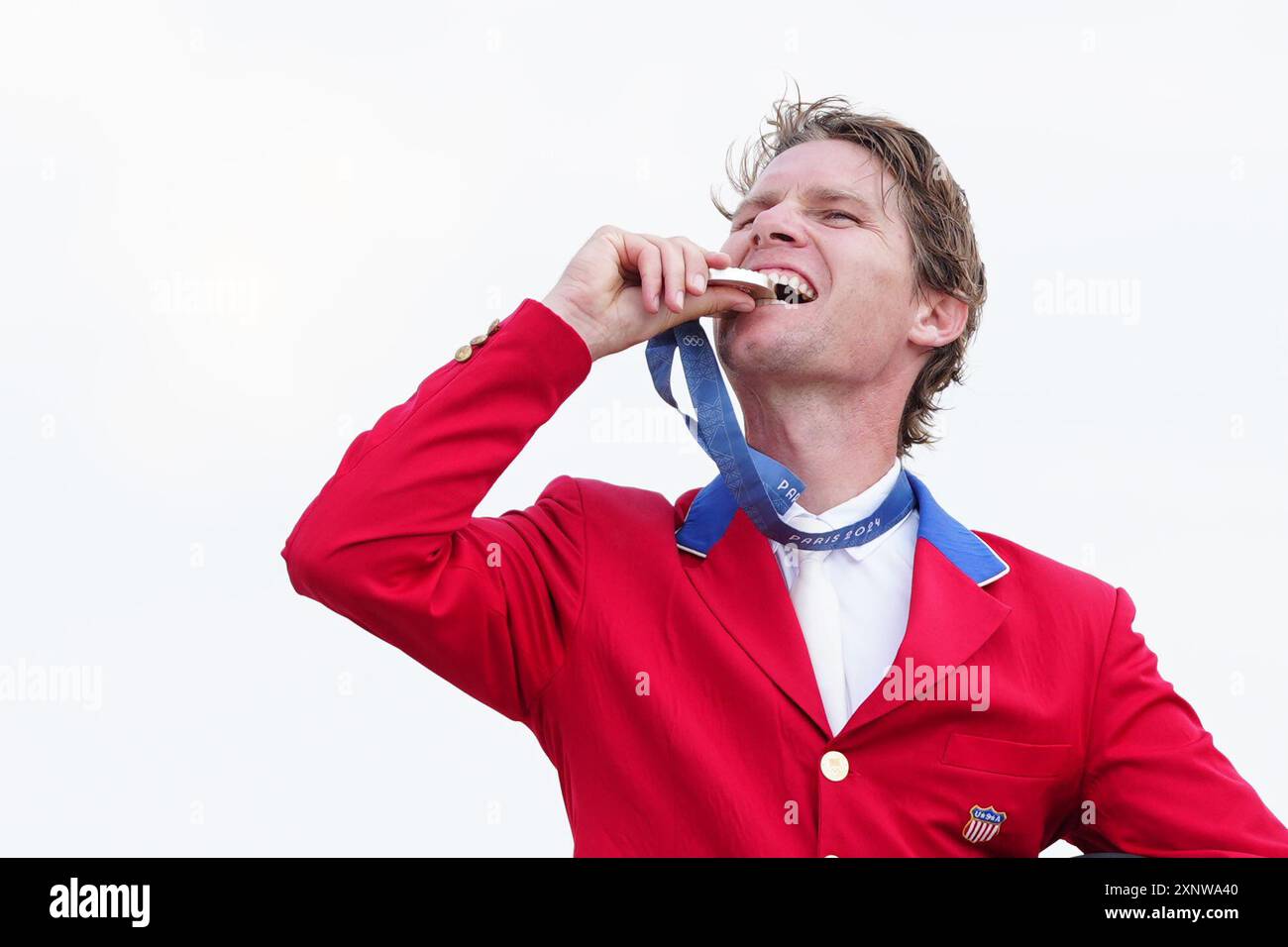 USA's' Karl Cook celebrates with their silver medal during the ceremony ...