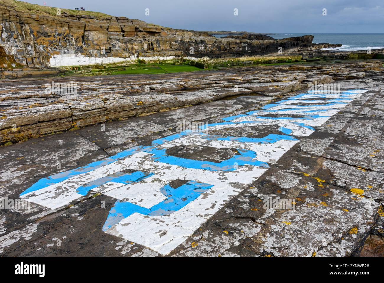 Painted sign at the Trinkie, an outdoor swimming pool at Wick ...