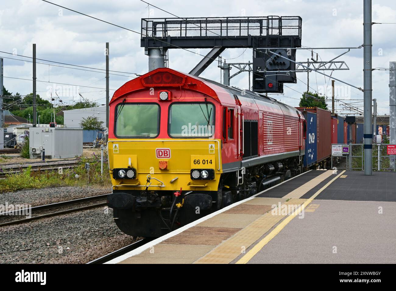 DB class 66 diesel leads train of containers south through Peterborough ...