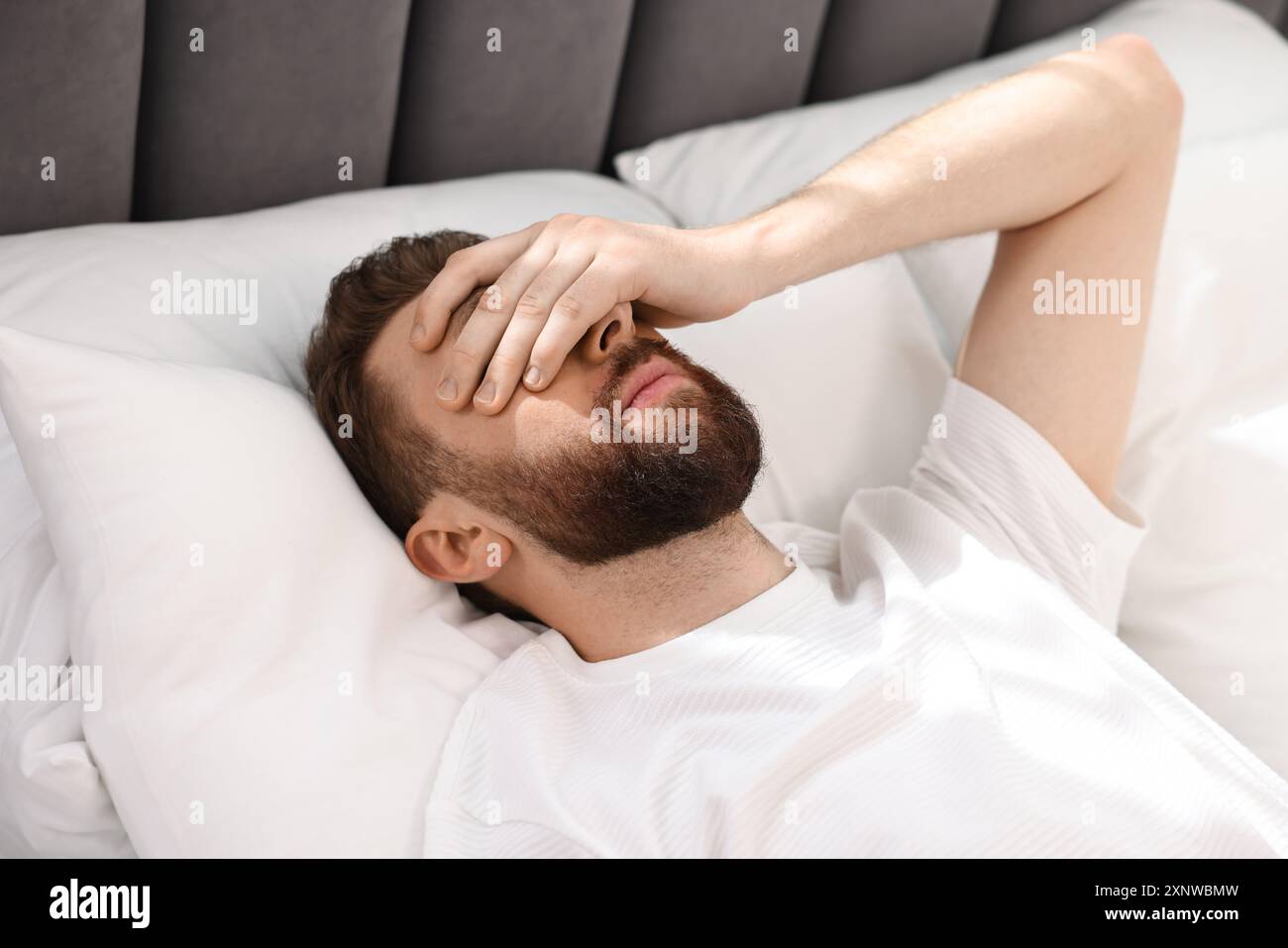 Man sleeping waking up alone hi-res stock photography and images - Alamy